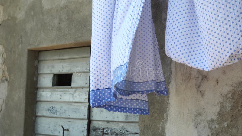 Sheet in the Wind with a Polka Dot Design, Seen in Detail on a Building ...