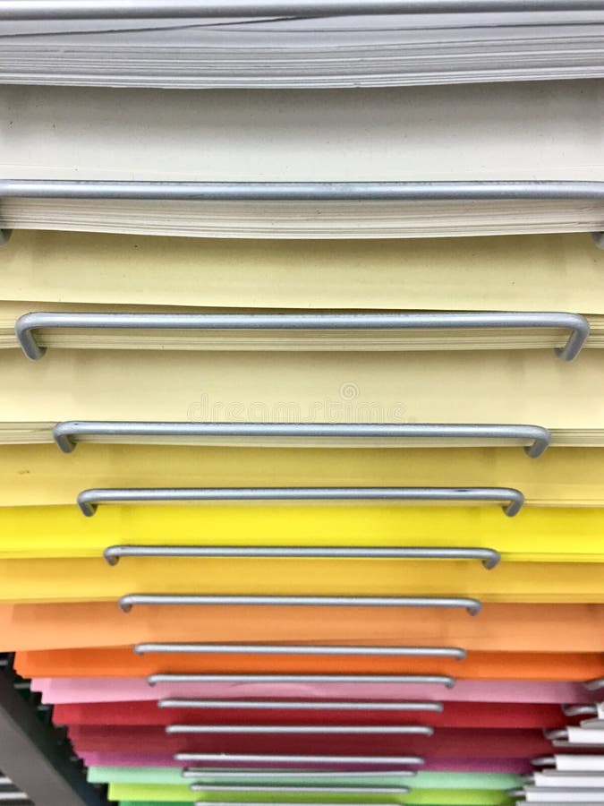 Sheets of Colored Paper Folded in a Row Stock Image - Image of yellow ...