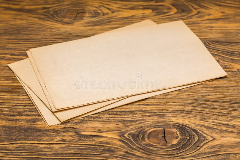 Stack Of Old Paper Sheets On Wooden Table Stock Image - Image of ...