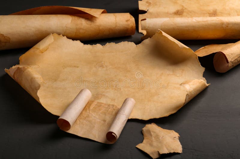 Sheets of Old Parchment Paper on Grey Wooden Table Stock Photo - Image ...
