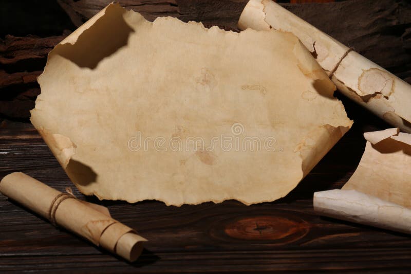 Sheets of Old Parchment Paper on Wooden Table Stock Photo - Image of ...