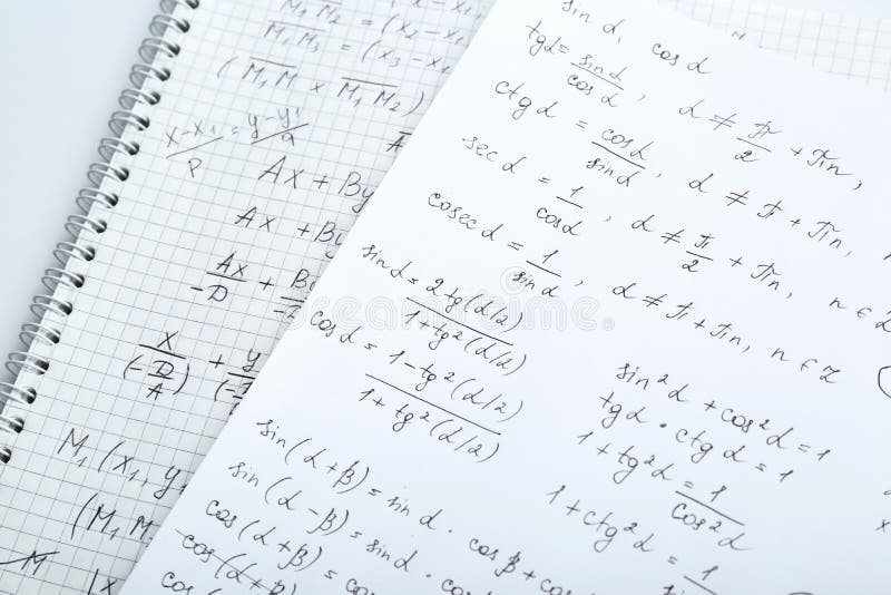 Sheets of Paper with Different Mathematical Formulas on Table, Closeup ...