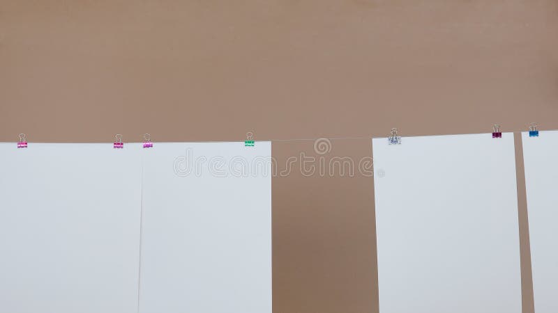Sheets of Paper Hanging from a Thread Stock Image - Image of paper ...