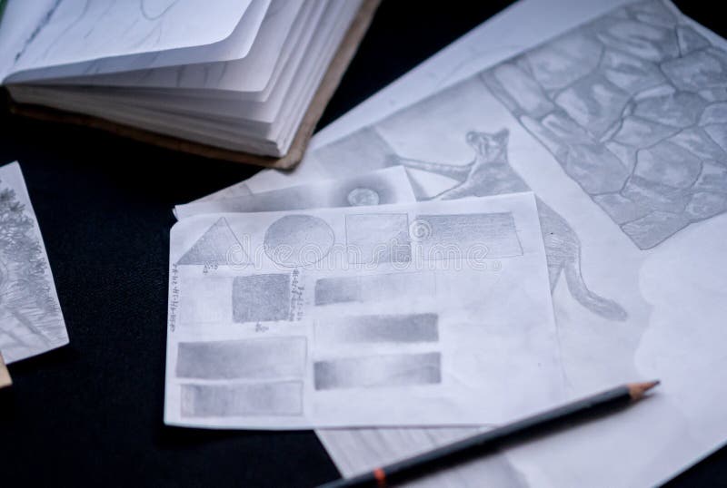 Sheets with Pencil Drawings with Concept in Close Up Stock Photo ...