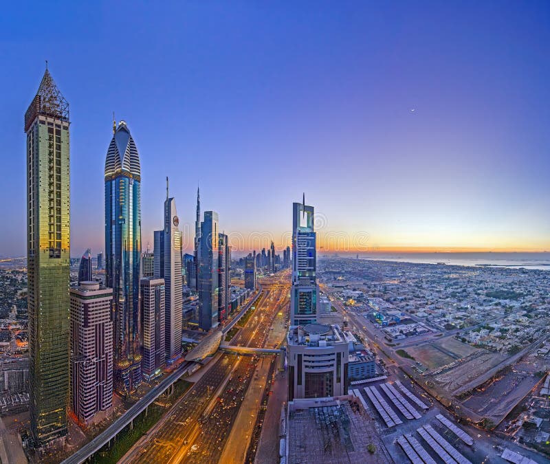 Sheikh Zayed Road Skyline in Dubai with Sunset and Skyscrapers ...