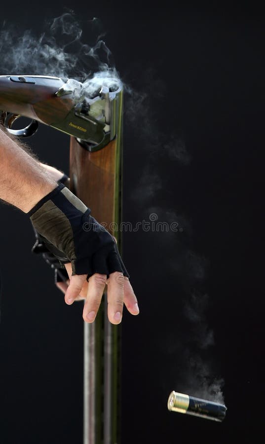 Shel ejected from a gun stock photo. Image of shotgun - 83710398