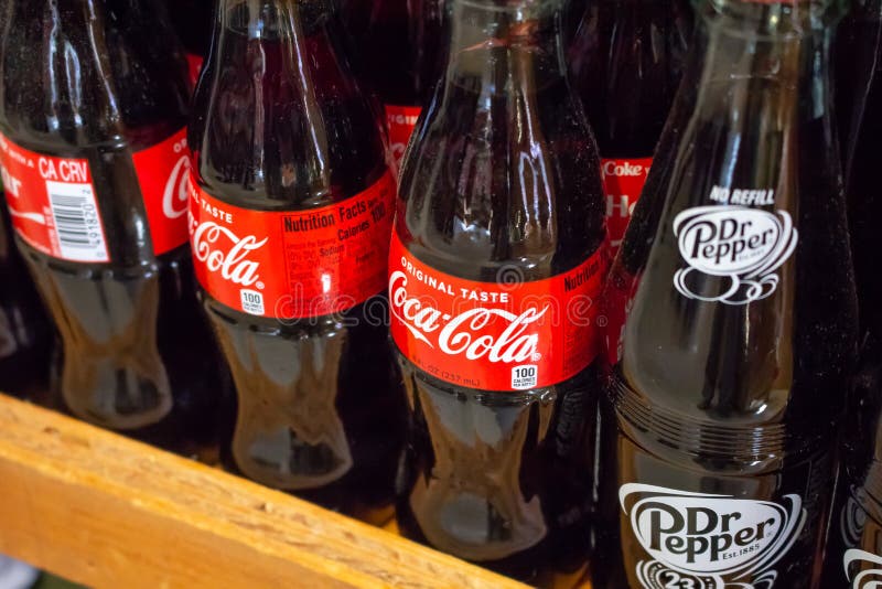A Shelf of Coca Cola Bottles Editorial Photography - Image of aluminum ...