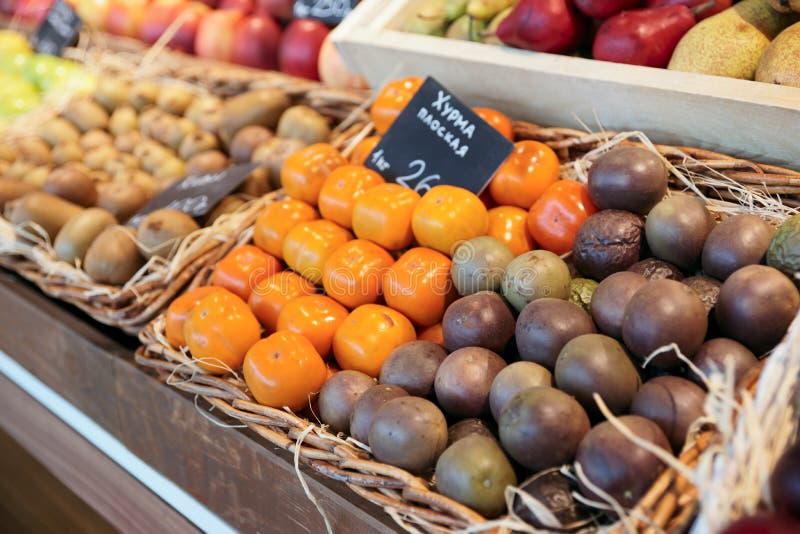 Shelf with fruits stock photo. Image of persimmon, long - 19131654
