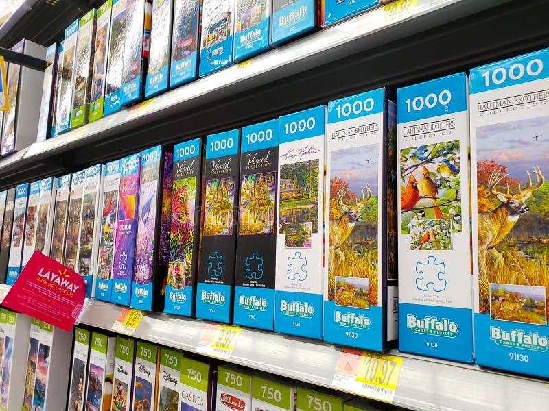 Shelf of puzzles editorial photography. Image of move - 174166597