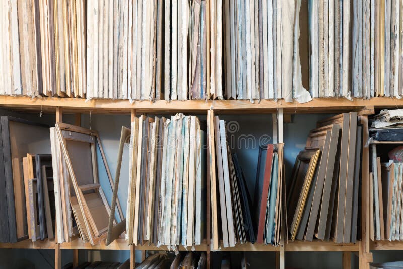 A Shelf Rack with Paintings Stock Image - Image of colorful, creative ...