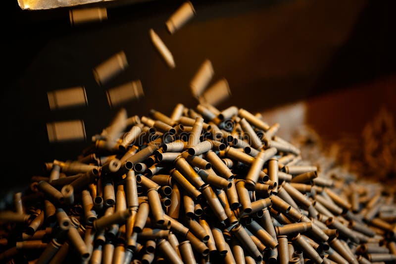 Shell Casings Fall Down in Ammunition Production Workshop Stock Photo ...