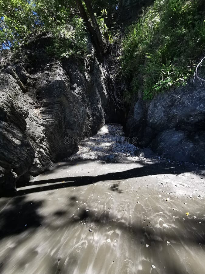 Shell Cove with Receding Tide Stock Photo - Image of water, watercourse ...