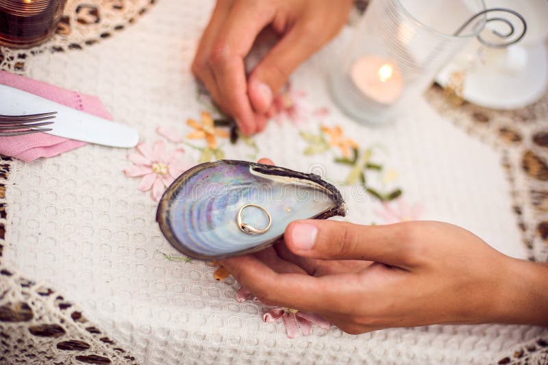 Shell with Engagement Ring Inside Stock Photo - Image of precious ...