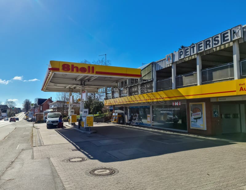 A Shell Gas Station with Customers on a Sunny Day Editorial Photo ...
