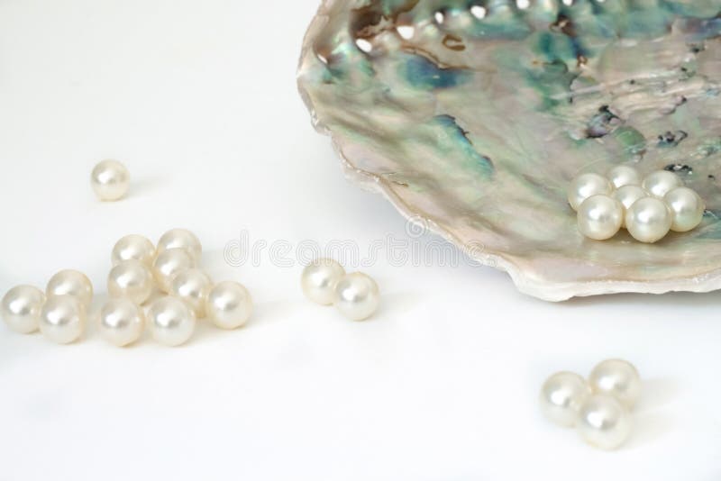 Shell with Nacre Ultramarine Pattern and Bunch of Pearls Isolated White ...