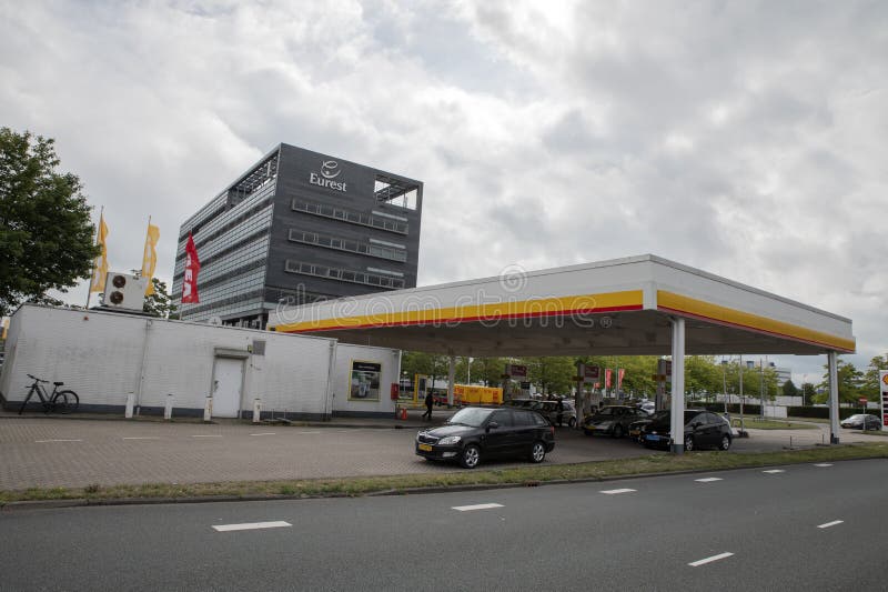 Shell Gas Pump Nozzles at a Service Station Editorial Photo - Image of ...
