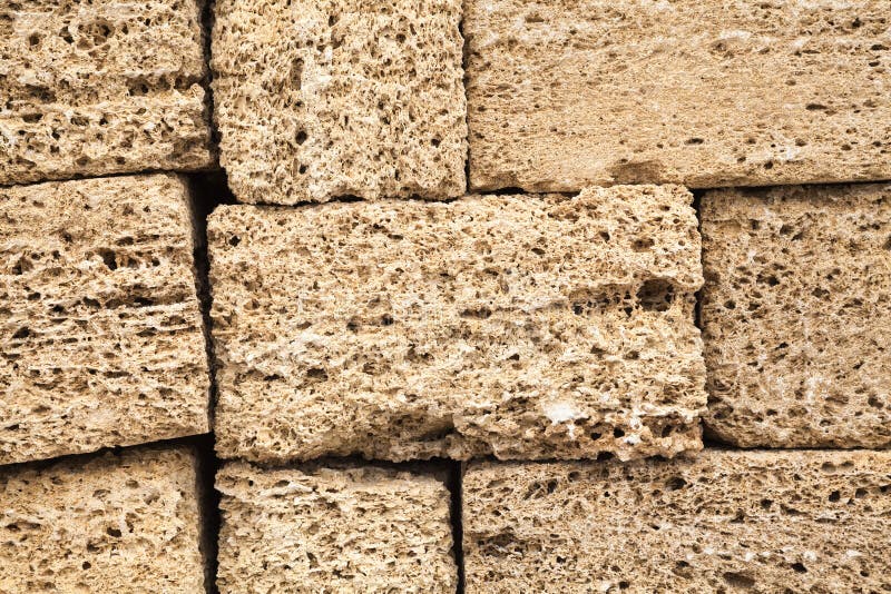 Blocks Of Shell Rock Are Stacked. Material For Building Construction ...