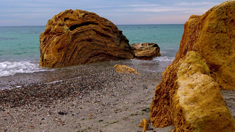 Shell Rock with Curved Layers on a Beach by the Sea, Geological ...
