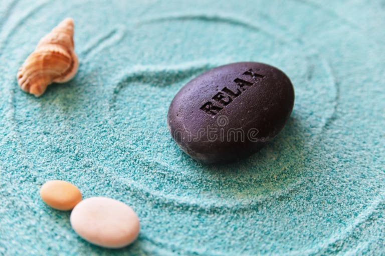Shell and Stone Relax on a Blue Sand Stock Photo - Image of mind ...