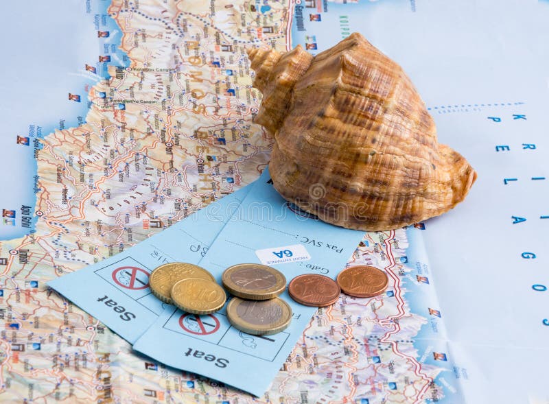 Shell, Tickets and Coins on the Map. Stock Photo - Image of currency ...