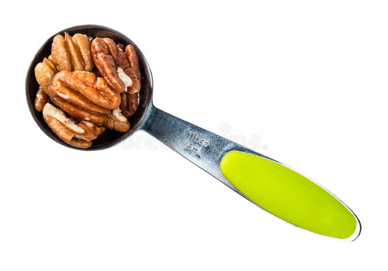 Shelled Pecan Nuts in Measuring Spoon Cutout Stock Photo - Image of ...