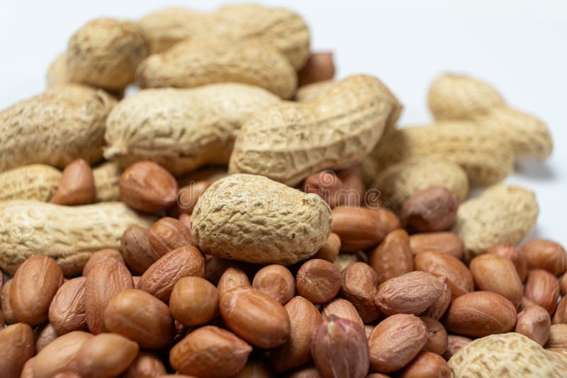 Shelled and Unshelled Peanuts Close-Up Stock Photo - Image of groundnut ...