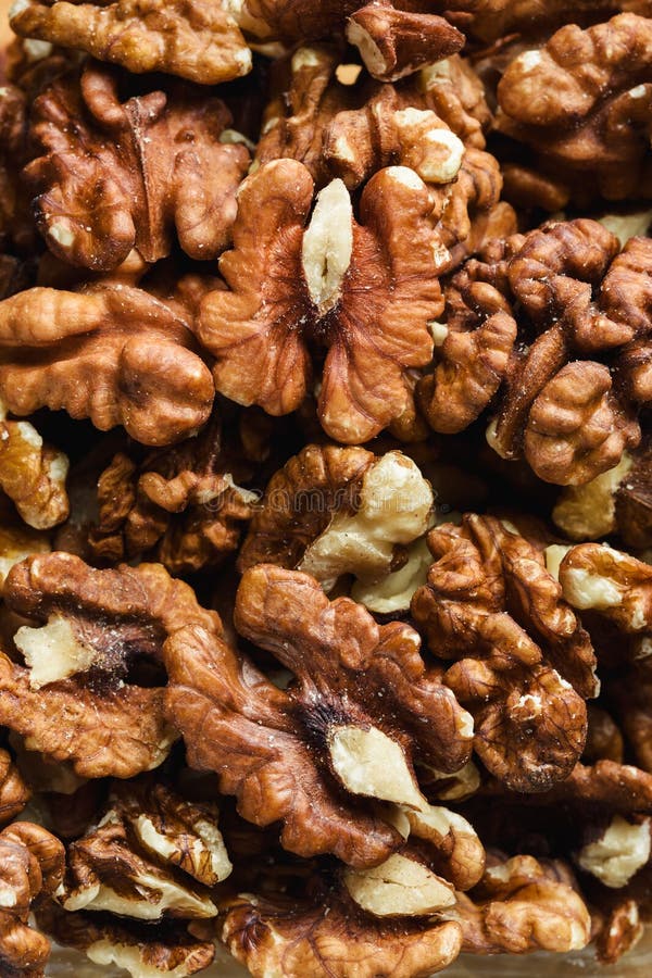 Shelled walnuts close-up stock photo. Image of culinary - 359245900