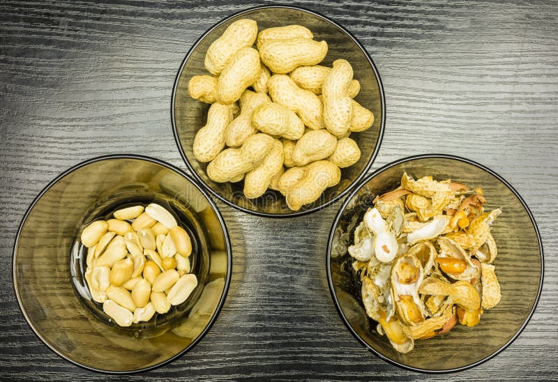 Peeling Peanuts. a Bowl of Peels and Clean Peanuts on the Plate. View ...