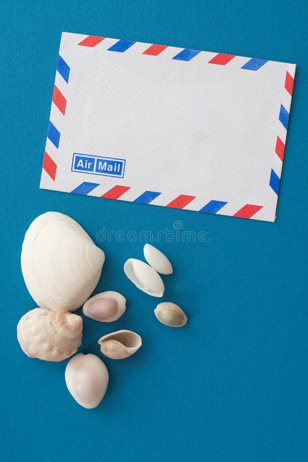 Shells and Envelope on Blue Stock Photo - Image of seashell, mail: 32116752