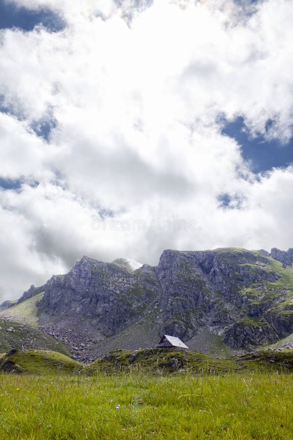Shelter in the Middle of a Valley Stock Photo - Image of grass, green ...