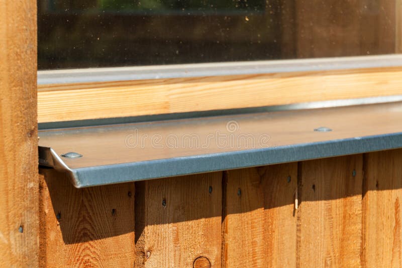 Sheltered Window Sill. Galvanized Sheet Metal on the Window. Building ...