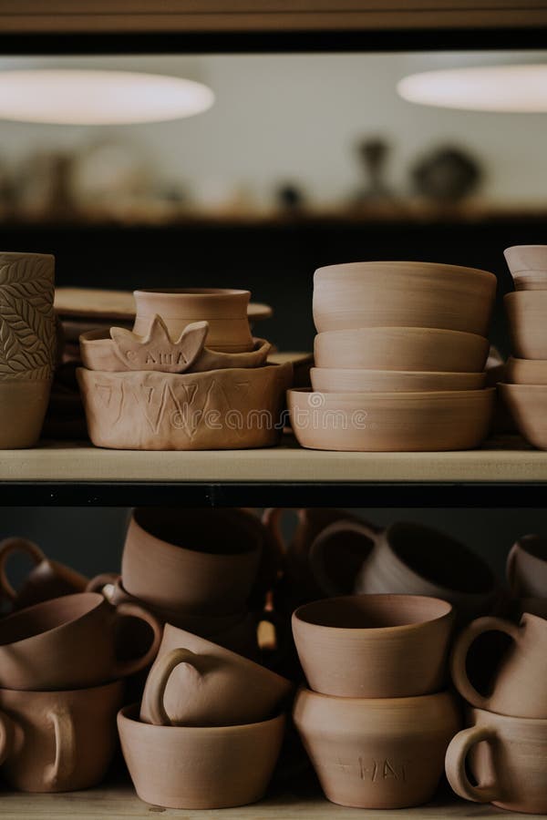 Shelves with Ceramic Dishware in Pottery Workshop Stock Photo - Image ...