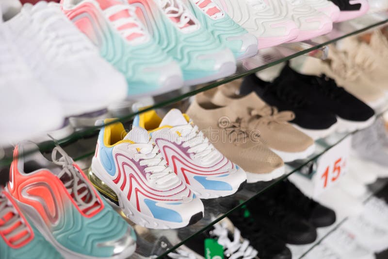 Shelves with Different Sport Shoes in Shoes Shop Stock Photo - Image of ...
