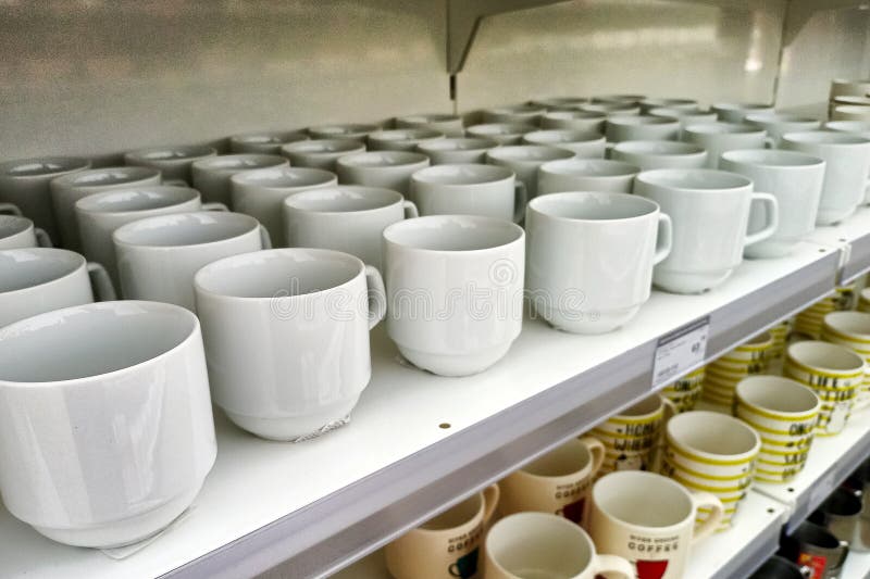 Shelves Filled with Assorted Coffee Cups in Store Stock Image - Image ...
