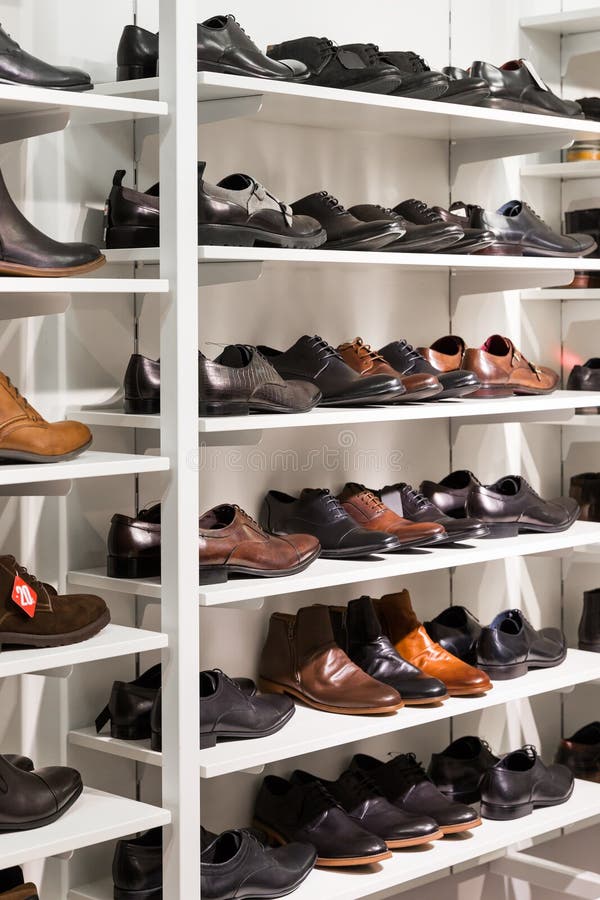 Shelves with Men`s Shoes in a Store Stock Photo - Image of boots ...