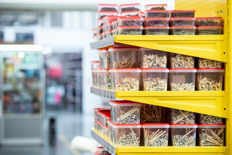 Shelves with Nails in Plastic Containers in Hardware Store Stock Photo ...