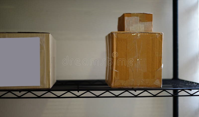Shelves with Parcel Boxes in Apartment. Stock Photo - Image of ...