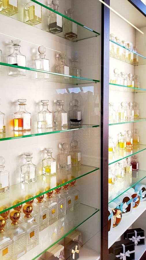 The Shelves of a Perfume Store, on Which There are Bottles with Samples ...