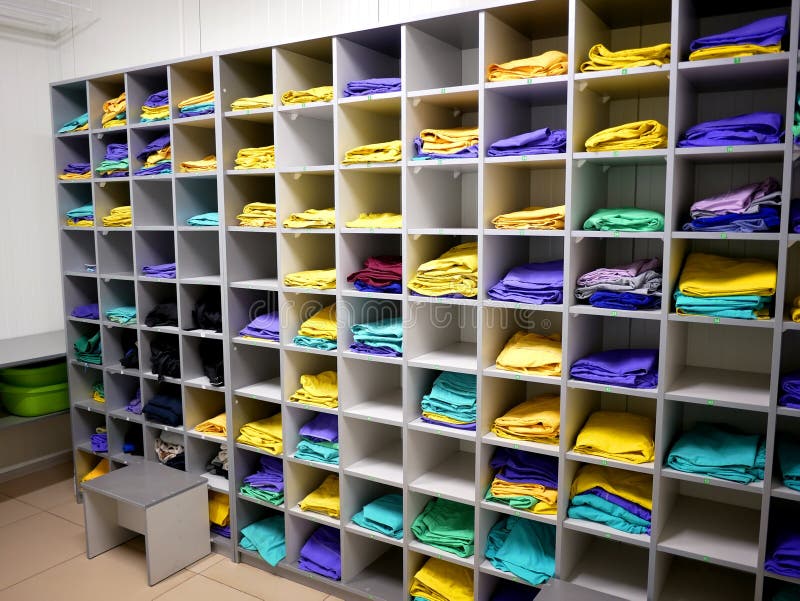 Shelves for Storage of Work Clothes of Workers at the Enterprise Stock ...