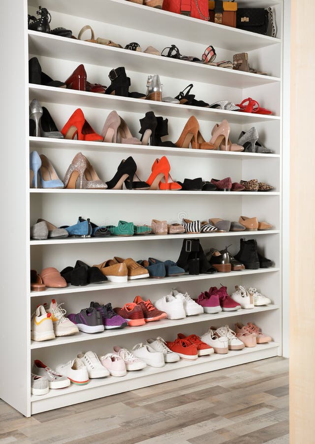 Shelving Unit with Different Shoes Stock Image - Image of organizing ...