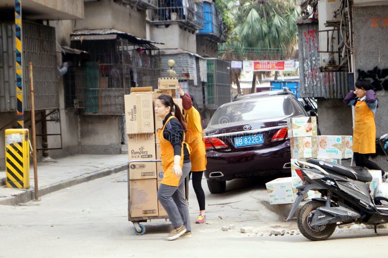 Unloading goods editorial photo. Image of asian, carrying - 26208721