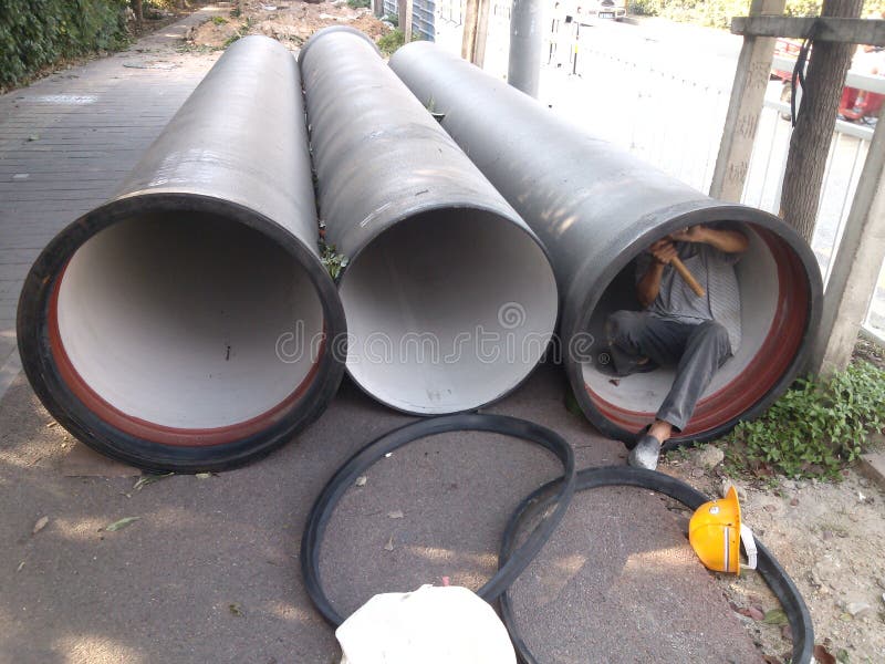 Shenzhen, China: Workers are Installing a Giant Pipe Editorial ...