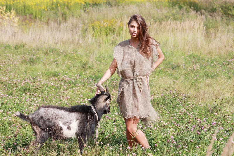 Shepherdess. stock photo. Image of goat, adult, horns - 10921684
