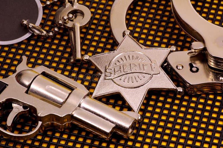 480 Handcuffs Sheriff Stock Photos - Free & Royalty-Free Stock Photos ...