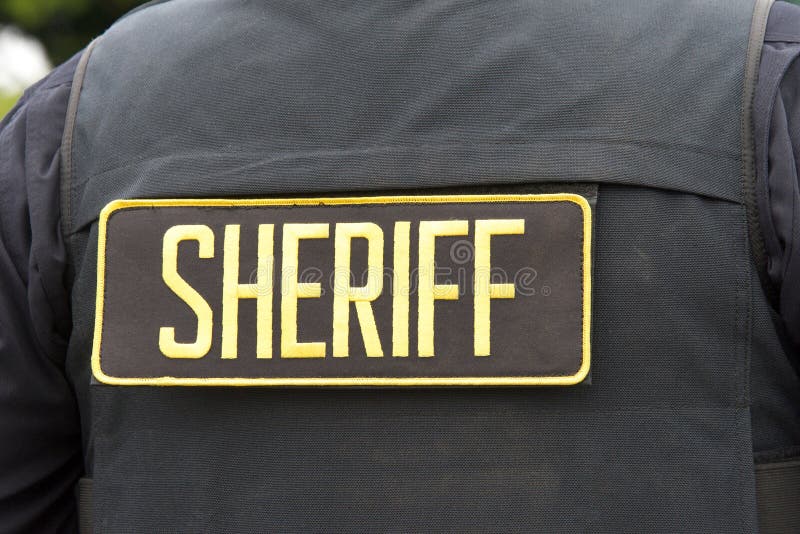 Sheriff Letters on Back of a Flack Jacket, Close Up Stock Image - Image ...