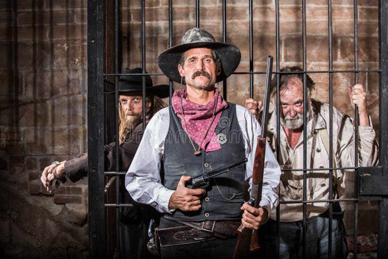 Sheriff Poses with Prisoner Foto de archivo - Imagen de metal ...