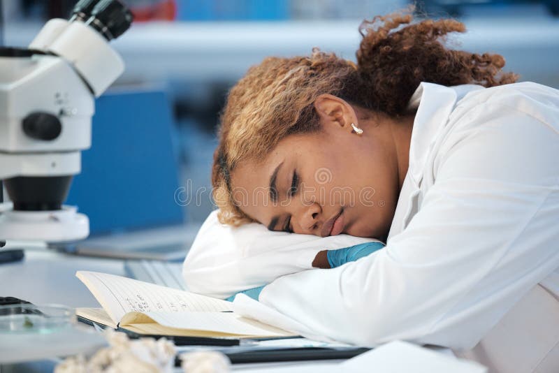 Shes Been Burning the Midnight Oil. an Exhausted Lab Tech Taking a Nap ...