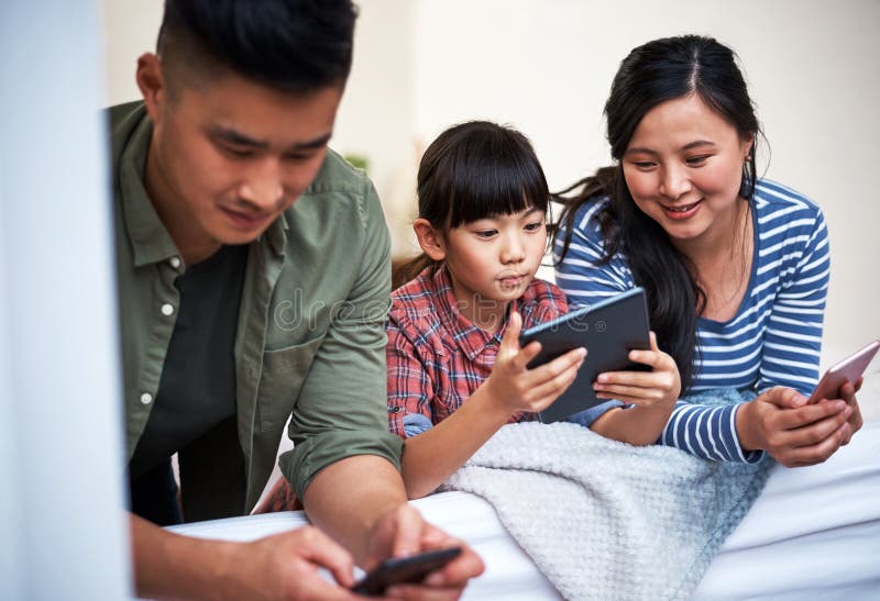 Shes always Been Surrounded by Technology. a Family Using Digital ...