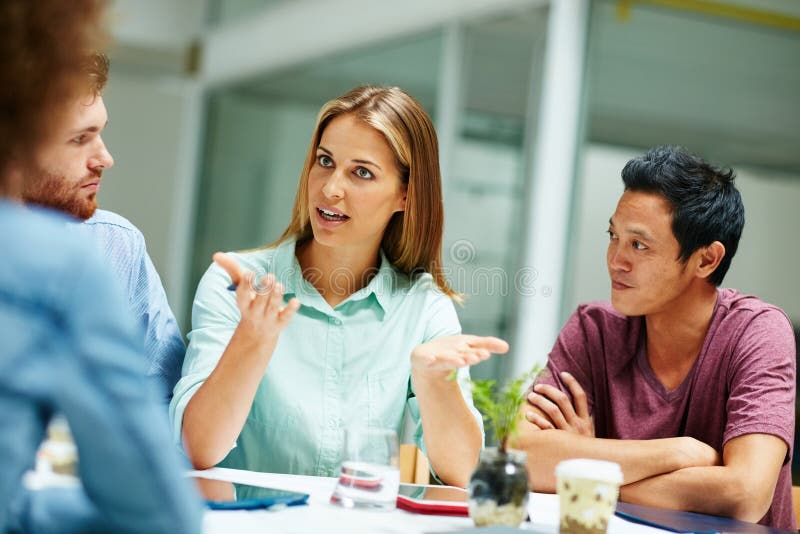 Shes the Boss with a Plan. a Group of Businesspeople Talking Together ...