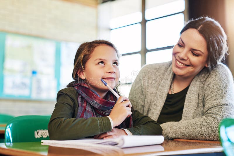 Shes Carefully Thinking of an Answer. an Elementary School Girl Getting ...